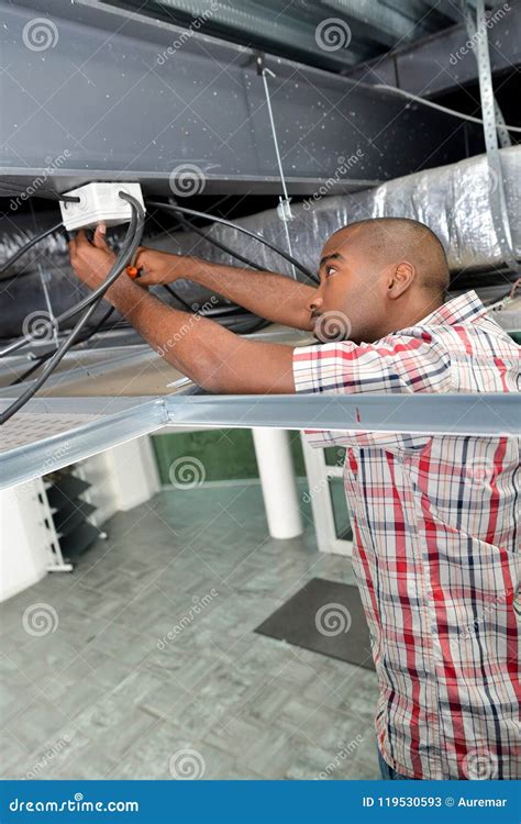 Checking Electrical Cabling In Ceiling Stock Image Image Of Collar