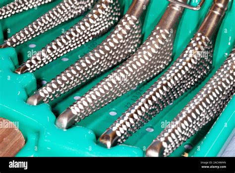 Hip Replacement Implants Different Sizes Of Femoral Implants Laid Out
