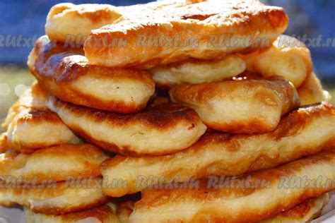 Жареные дрожжевые пирожки с картошкой 13 фото в рецепте