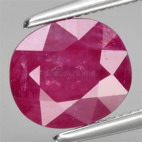 Exquisite Close Up Of A Lustrous Pink Ruby Gemstone Captured With Precision And Elegance Stock