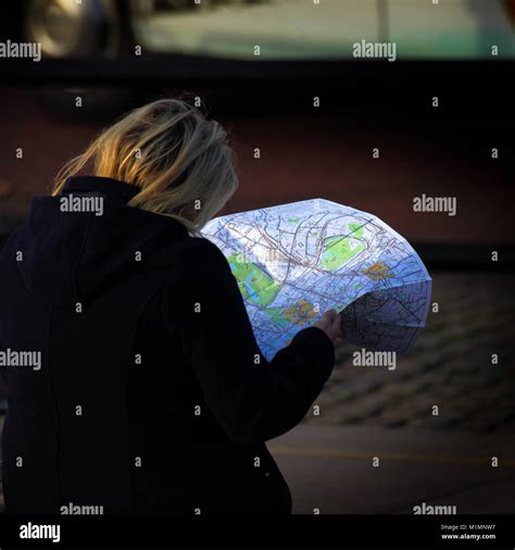 Woman Reading A Map Stock Photo Alamy