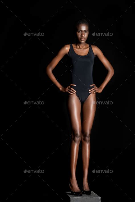 Full Length View Of Beautiful African American Girl In Bodysuit