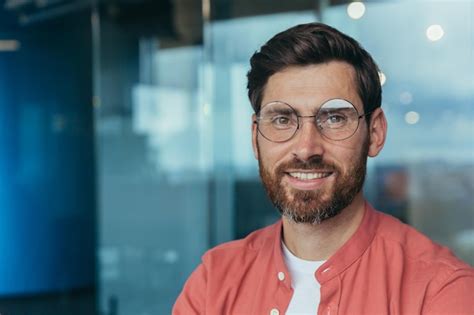 Premium Photo Closeup Photo Of Happy And Successful Smiling Programmer In Red Casual Shirt Man