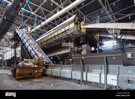 Recycling Plant Conveyor Belt Transports Garbage Inside Drum Filter Or