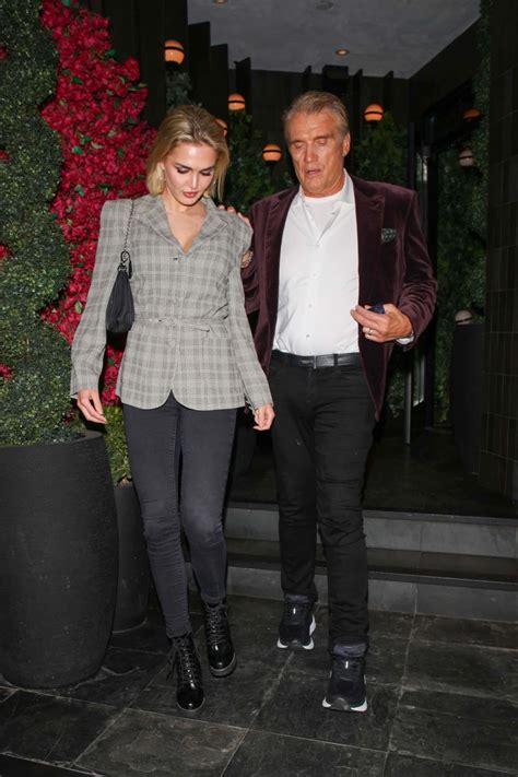 Dolph Lundgren 65 And Fiancee Emma Krokdal 25 Make A Stylish Entrance During Dinner Date In