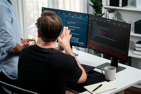 It Developers Discussing Online Software Development Information