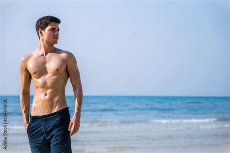 Portrait Of Handsome Sexy Caucasian Man On The Beach Young Healthy