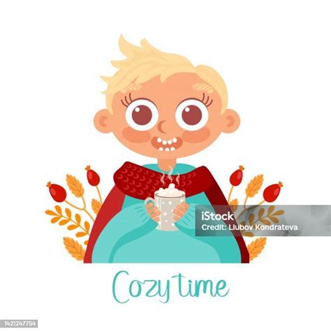 아늑한 시간 파란색 스웨터와 빨간 스카프를 입은 쾌활한 금발 소년이 마시멜로와 함께 코코아를 마신다 가을 단풍과 열매 따뜻한 옷