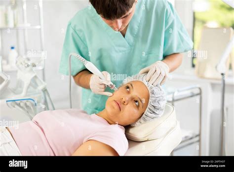 Using Device And Hydrogen Oxygen Cleaning Attachment Stock Photo Alamy