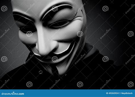 Man Wearing Anonymous Mask This Mask Is A Well Known Symbol For The Online Hacktivist