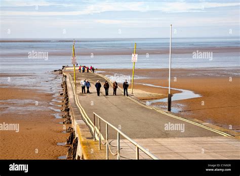 Burnham On Sea Jetty And Launching Ramp With People Walking Somerset Uk