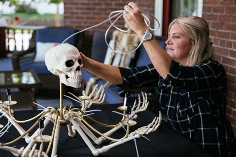 Diy Halloween Lighting Decoration Made From A Skeleton And An Old Light