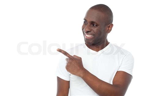Happy Man Pointing At Something Stock Image Colourbox