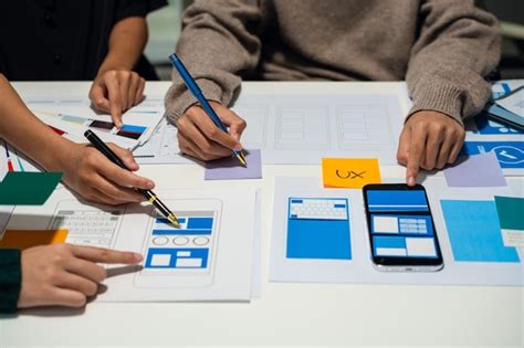 Premium Photo Developer And Designer Brainstorming And Color Code User Experience Concept