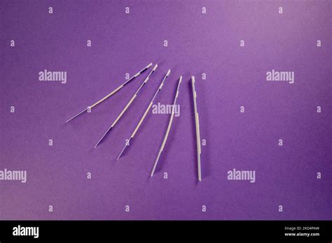 Five Phosphate Test Strips Isolated On A Purple Background Stock Photo