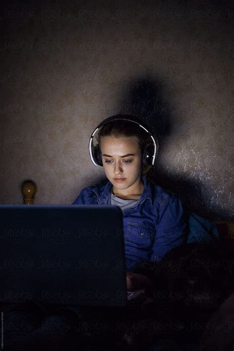 Babe Woman Using Notebook At Night By Stocksy Contributor Danil Nevsky Stocksy