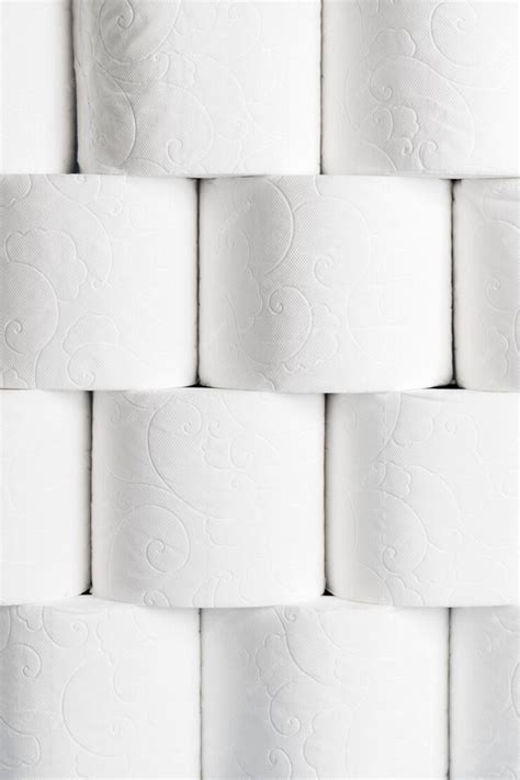 Free Photo Front View Of Neatly Stacked Toilet Paper Rolls