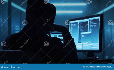 Computer Hacker In Hoodie Obscured Dark Face Concept Of Hacker Attack Virus Infected Software