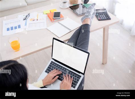 Top View Of Woman Use Laptop And Leg On Table Chill Out Working At Home Mock Up Template Device