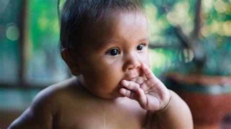 Baby Sucking On Hand Reasons Dangers How To Deal With It
