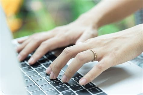 Premium Photo Asian Woman Hands And Married Ring Touching And Typing On Laptop Computer