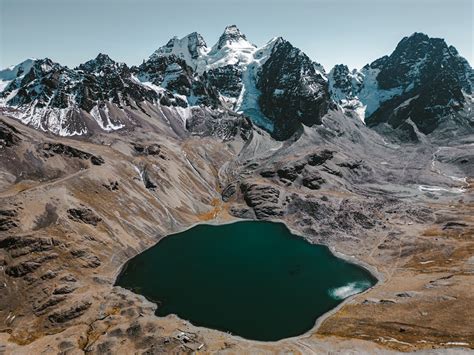 Andes 가벼운 감기 거친 경치 계곡 고립된 고요한 공중 광야 깨끗한 황야 남아메리카 높은 고도 눈 덮인 따뜻한 라군 모험 바위 같은 지형