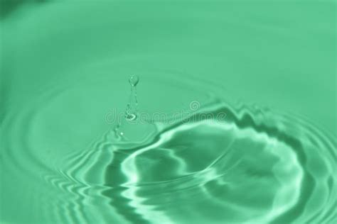 129one Or More Drops Of Water Splashing Into Waves And Undefined Shapes Wallpaper Stock Image