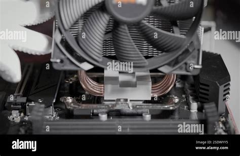 An Engineer Installs A Cooling System In A Supercomputer The Central