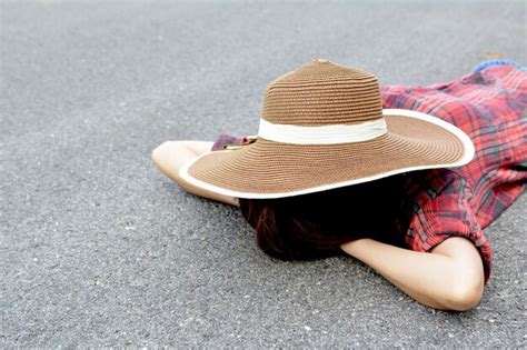 Premium Photo Woman Lying On Ground