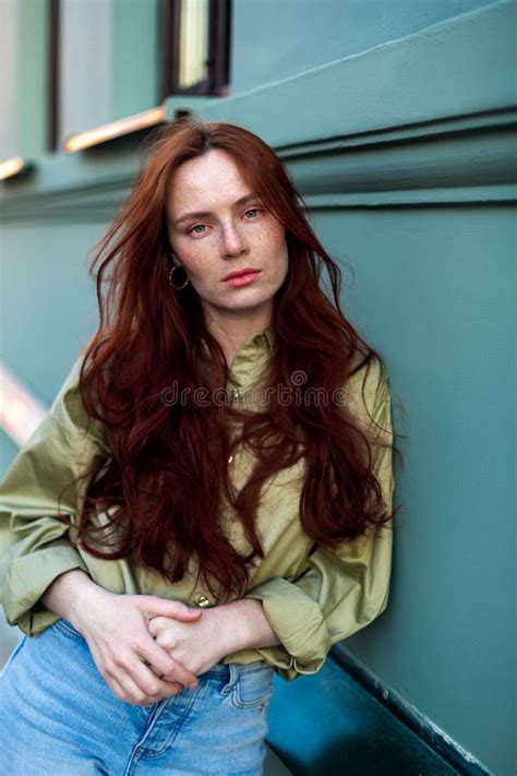 Young Woman With Long Ginger Hair Outdoors In City Young Woman Face