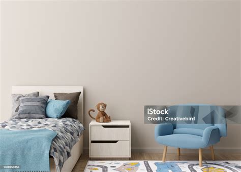 현대 어린이 방의 빈 크림 벽 스칸디나비아 스타일로 인테리어를 모의하십시오 사진이나 포스터를 위한 공간을 복사합니다 침대 안락 의자 장난감 아이들을위한 아늑한 방 3d