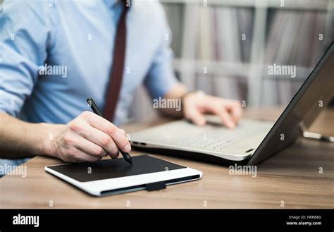 Man Using A Graphics Tablet In His Studio Stock Photo Alamy