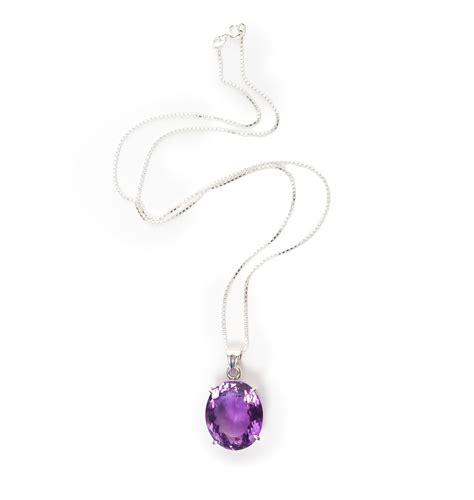 Lot A Sterling Silver And Amethyst Pendant Necklace