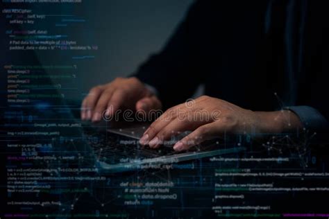 Hands Typing On A Laptop With Visible Coding And Encryption Data