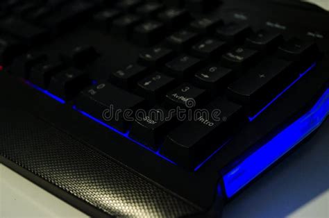 Black Gaming Keyboard Close Up With Blue Led Backlit Stock Image