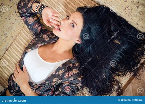 Beautiful Appealing Young Model With An Attractive Slim Appealing Body In Bikini Is Lying And
