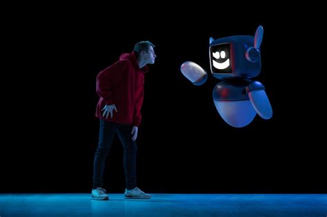 로봇의 3d 모델과 상호 작용하는 젊은이의 합성 이미지 인간과 기계 간의 능숙한 협력을 보여주는 이미지 25 29세에 대한 스톡 사진 및 기타 이미지 Istock