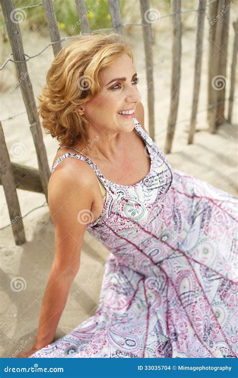 Portrait Of A Beautiful Older Woman Smiling Outdoors Stock Images Image 33035704