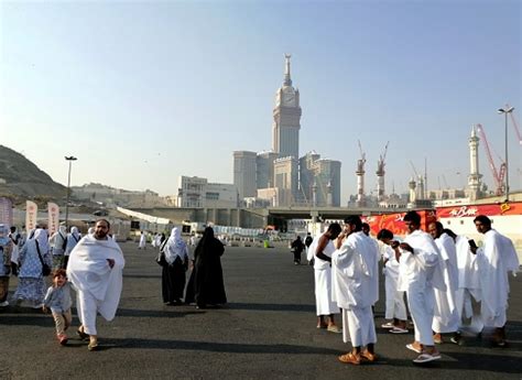 Pilgrims Wearing Ihram On The Way To Masjid Al Haram For Performing