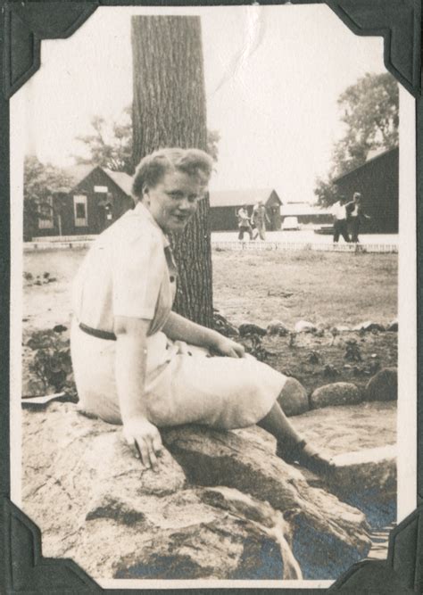 Woman Sitting On Rocks Free Download Borrow And Streaming