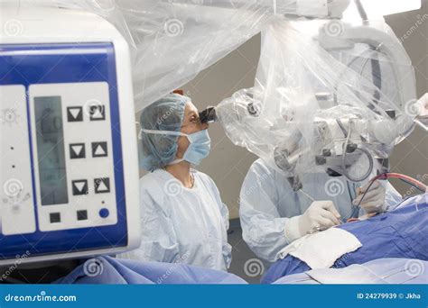Female Surgeon Using Operating Microscope Stock Image Image Of
