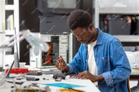 Free Photo Close Up On Man Working On Computer Chips