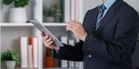 Business Professional Engaging With Technology In Modern Office