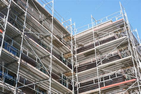 Scaffolding Background Construction Site Of An Apartment Block In