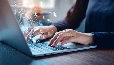 Hands Typing On Laptop Keyboard With Digital Icons Overlaying It Stock