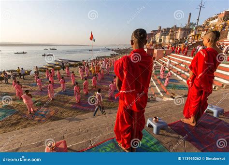 Young Hindu Monks Conduct A Ceremony To Meet The Dawn On The Banks Of
