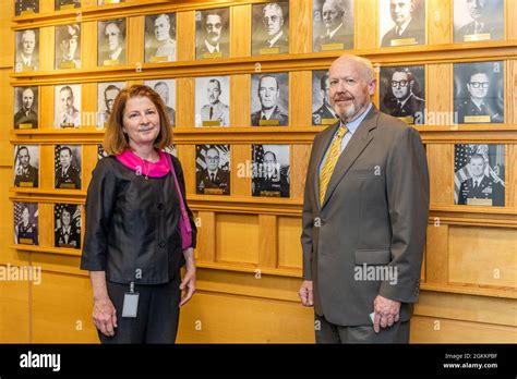 Retired Col Charles Mcqueen Right And Ms Mary Mcqueen Left Pose In Front Of Retired Col