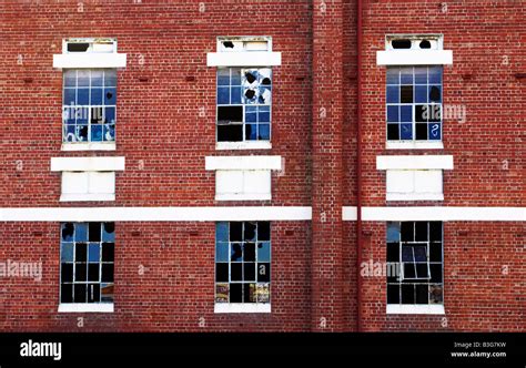 An Old Factory With Broken Windows Stock Photo Alamy