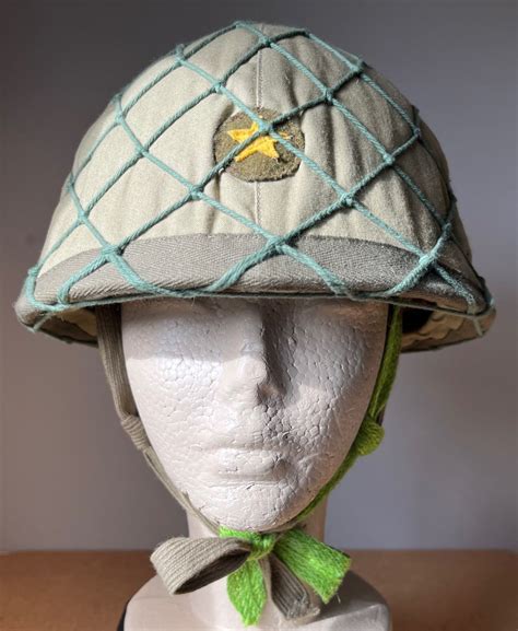 ways of tightening the chinstraps of the japanese m90 helmet