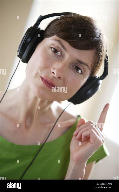 Woman Undergoing Pure Tone Audiometry Test And Hearing Threshold